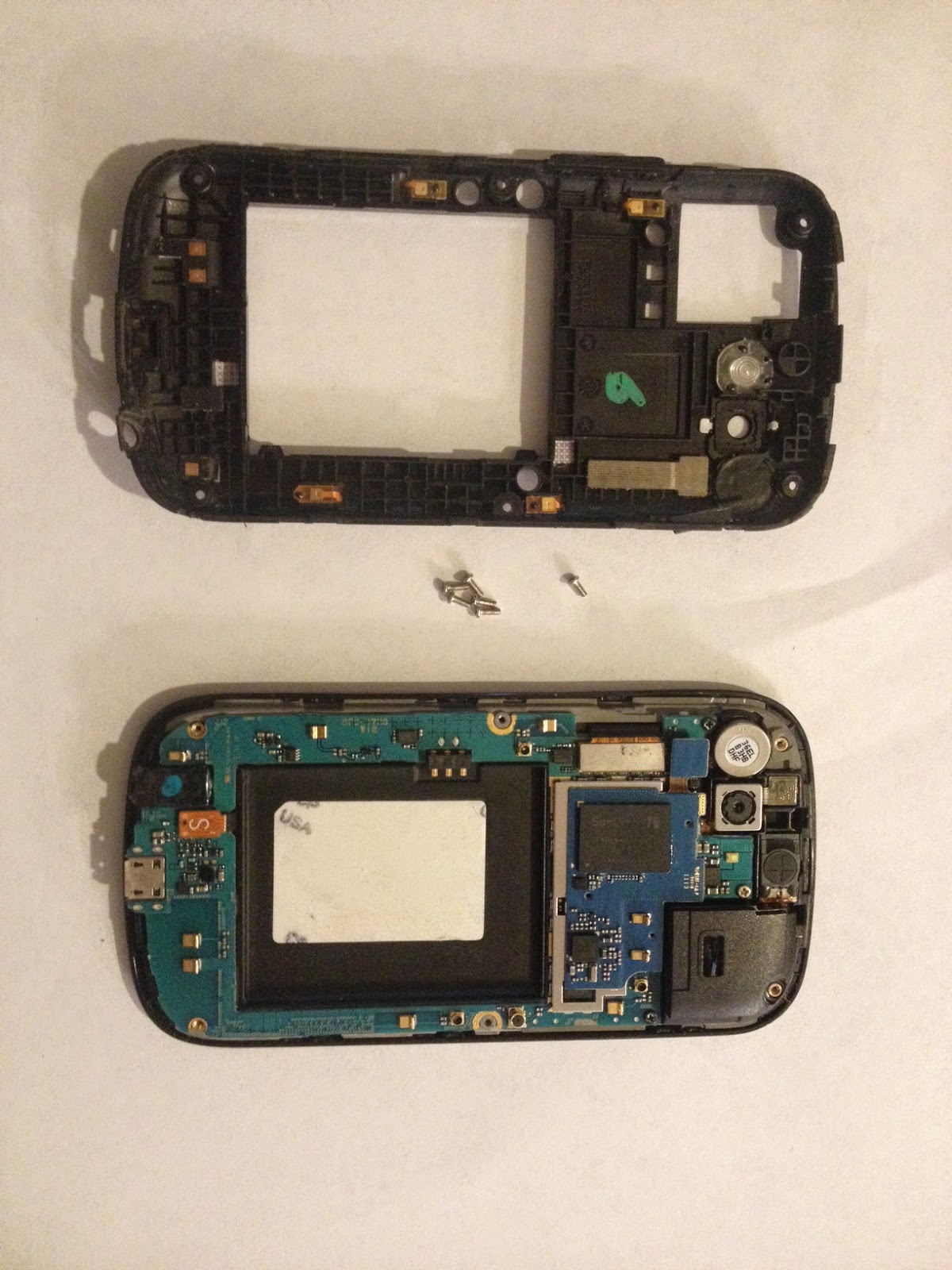 Laura Blake: INDD 0508 & 378 : Cell Phone Dissection
